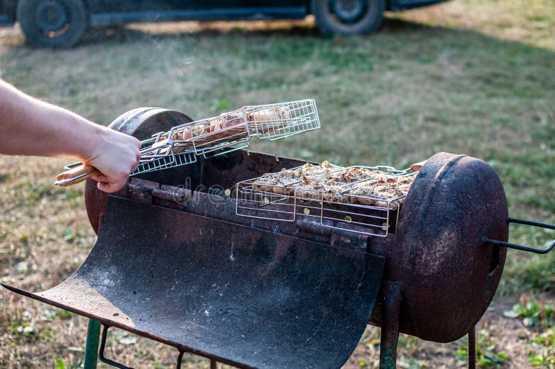 Cooking Raw Meat in a Grid on the Barbeque Grill Stock Image - Image of ...