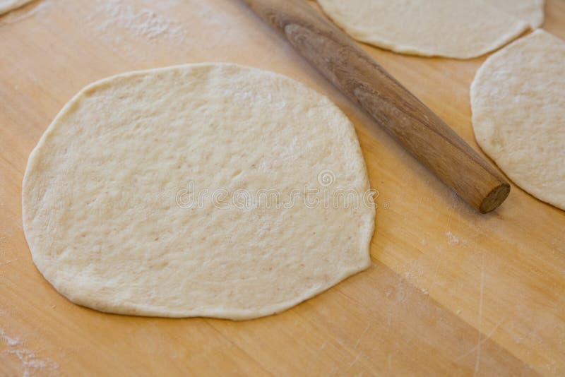 Raw round dough stock image. Image of dough, bake, rolling - 126682091
