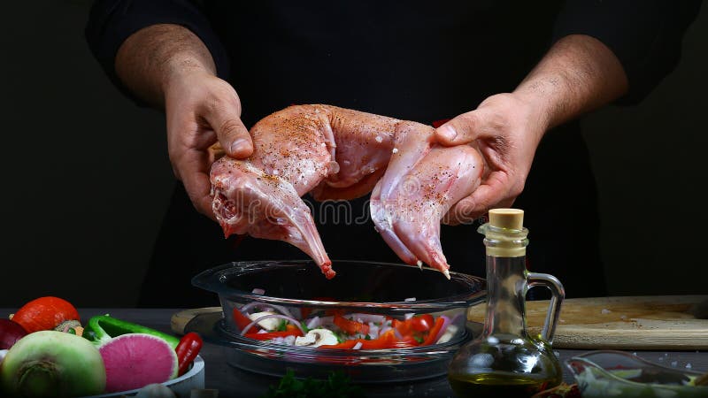 Cooking Recipe for Rabbit Meat Baked with Vegetables, Chef`s Hands ...