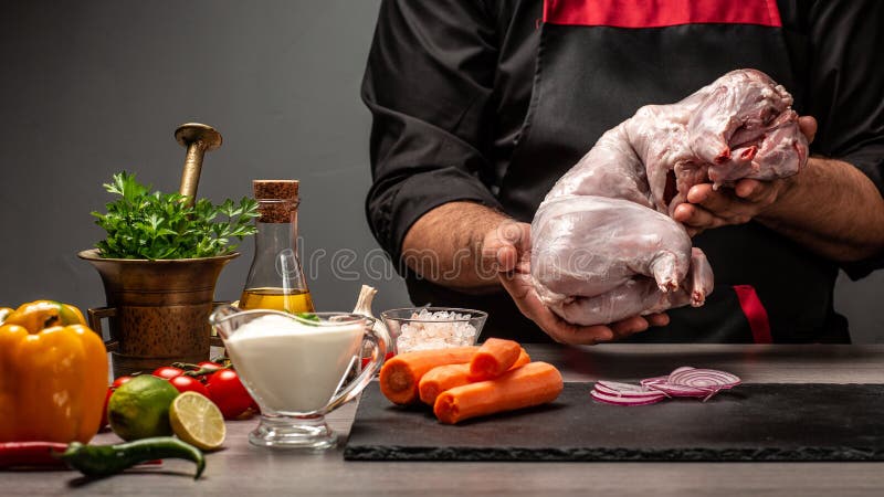 Cooking Recipe for Rabbit Meat Baked with Vegetables, Chef`s Hands ...