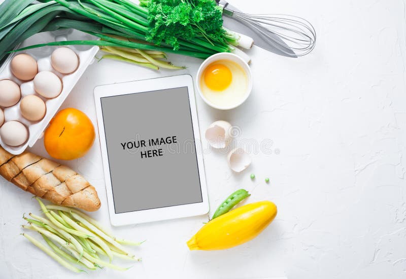 Cooking Recipes on Ipad with Vegetables on Background, Copy Space Stock ...
