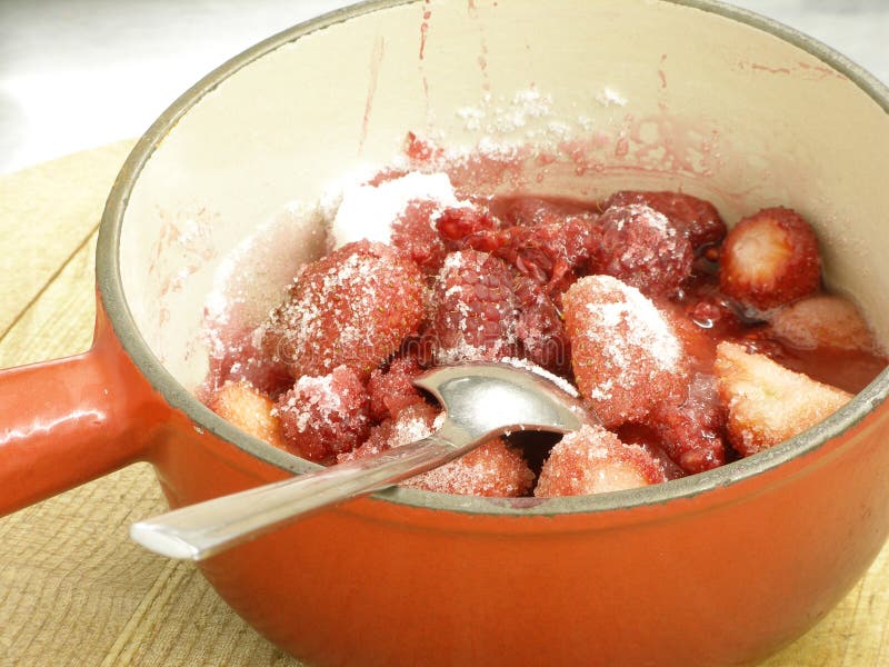 Cooking red fruits stock image. Image of coulis, cooking - 3229419