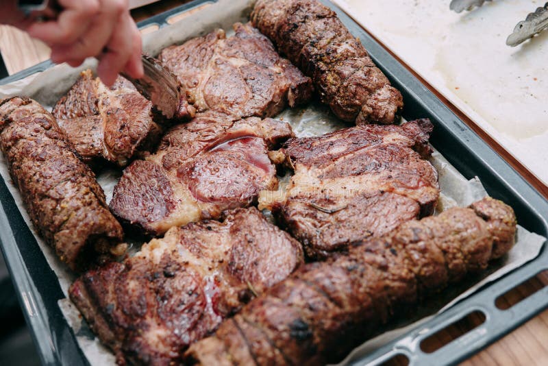 Cooking Ribeye Steaks and Meat Rolls in the Cooking Class. Cooked Meat ...