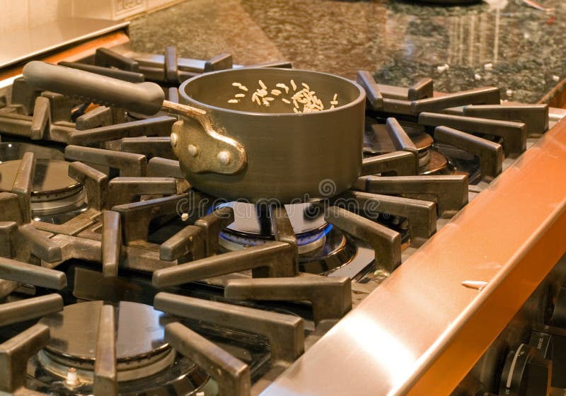 Cooking Rice stock image. Image of sauce, domestic, black - 1471955