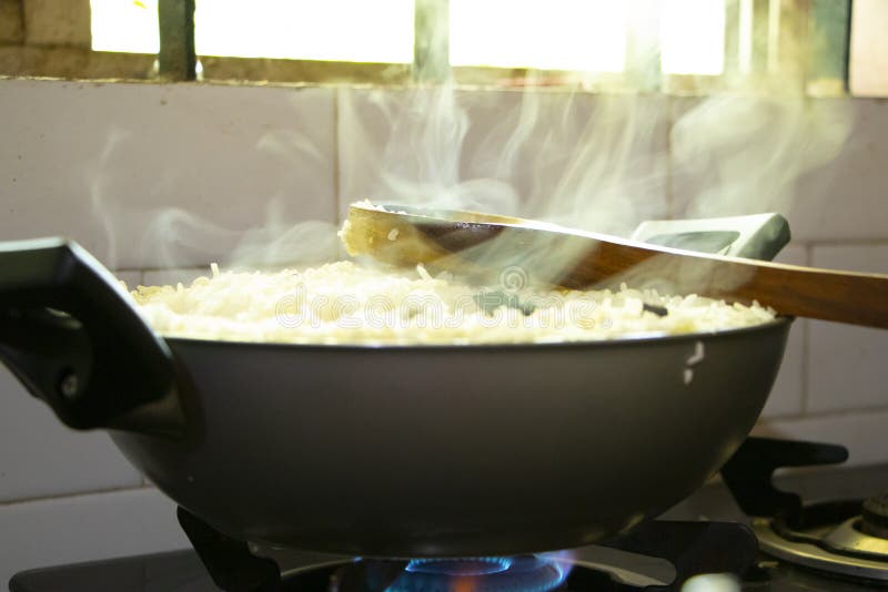 Cooking rice stock photo. Image of iron, food, ingredient - 196666958