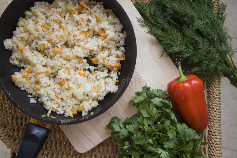 Frying pan with rice stock photo. Image of grains, cinnamon - 48119572