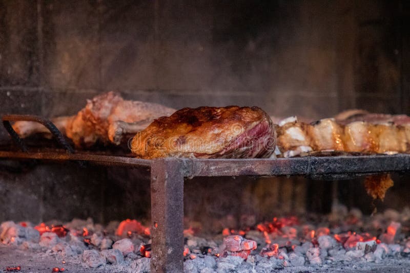 Cooking roast meat stock image. Image of skewer, savoury - 195116901