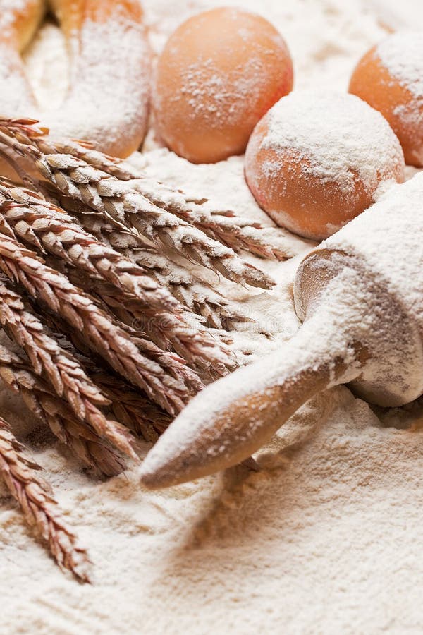 Cooking. Rolling Pin and Eggs in the Flour Stock Photo - Image of ...