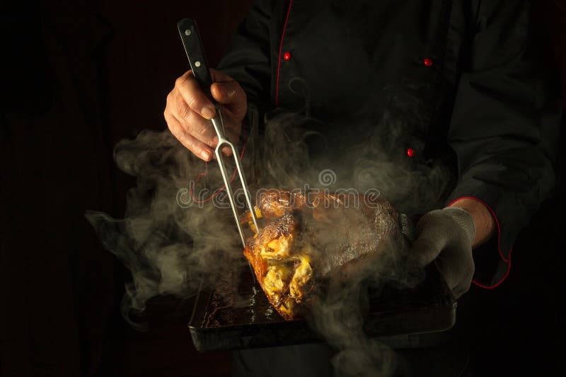 Cooking a Rooster Carcass on a Baking Sheet. Black Space for Recipe or ...