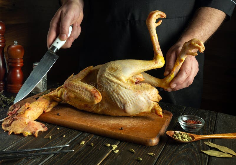 Cooking Rooster with Spices on the Kitchen Table for Lunch. Chicken ...