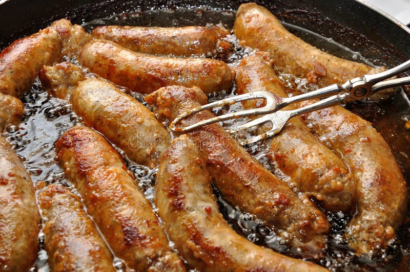 Cooking sausages stock image. Image of grilled, party - 13468647