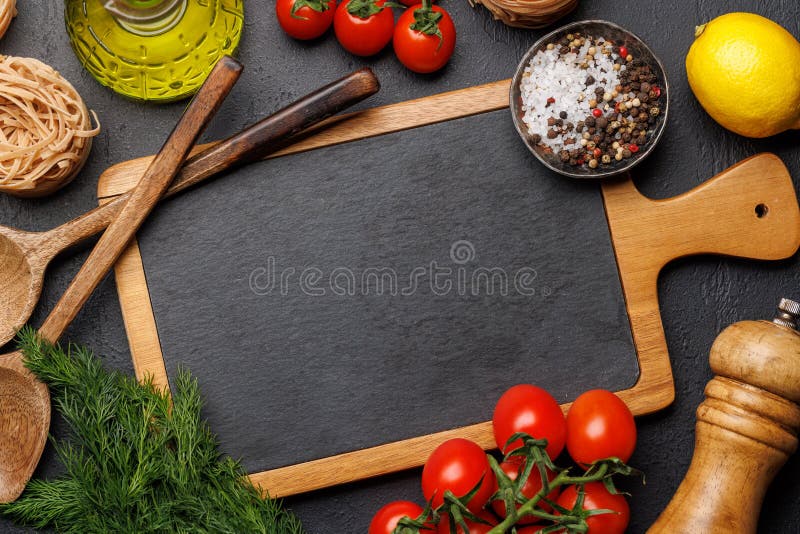 Cooking Scene: Cherry Tomatoes, Pasta, Spices on Table Stock Image ...