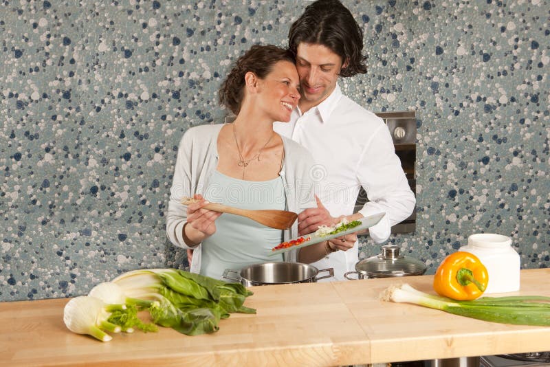 Woman Cooking Man With House Model Stock Image - Image of food, house ...