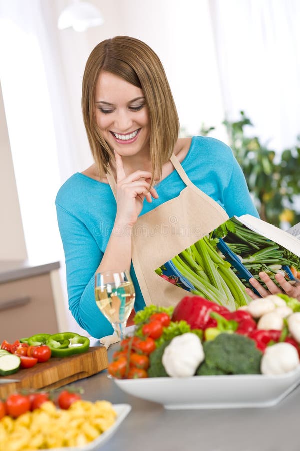 Cooking - Smiling Woman Holding Cookbook Stock Image - Image of female ...