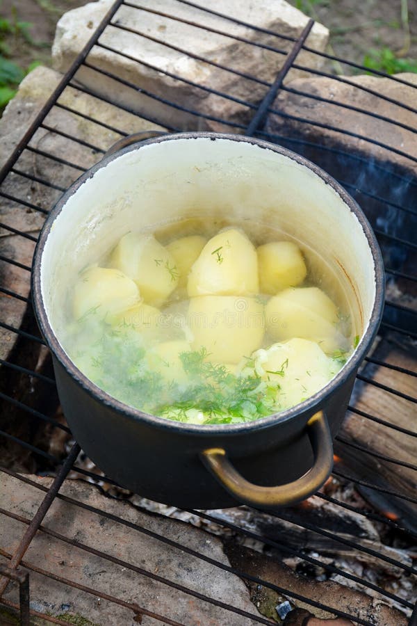 Cooking soup on fire stock image. Image of prepare, adventure - 74693283