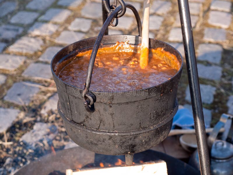 Cooking Soup Over Burning Campfire Stock Photo - Image of camp, fire ...