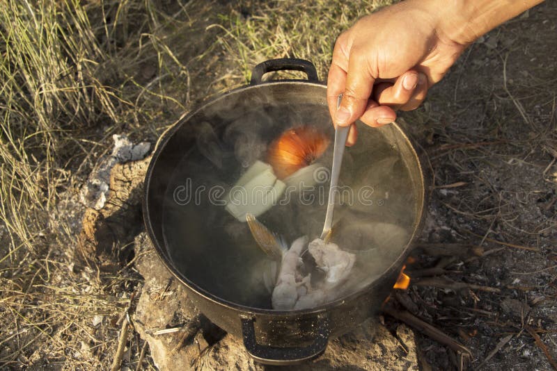 Cooking Soup Over Campfire in Hike Stock Photo - Image of burning ...