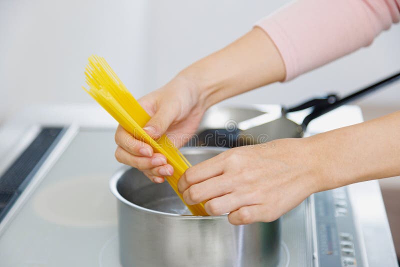 Cooking Spaghetti in the Kitchen Stock Photo - Image of sink, healthy ...