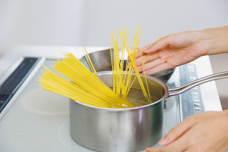 Cooking Spaghetti in the Kitchen Stock Image - Image of healthy ...