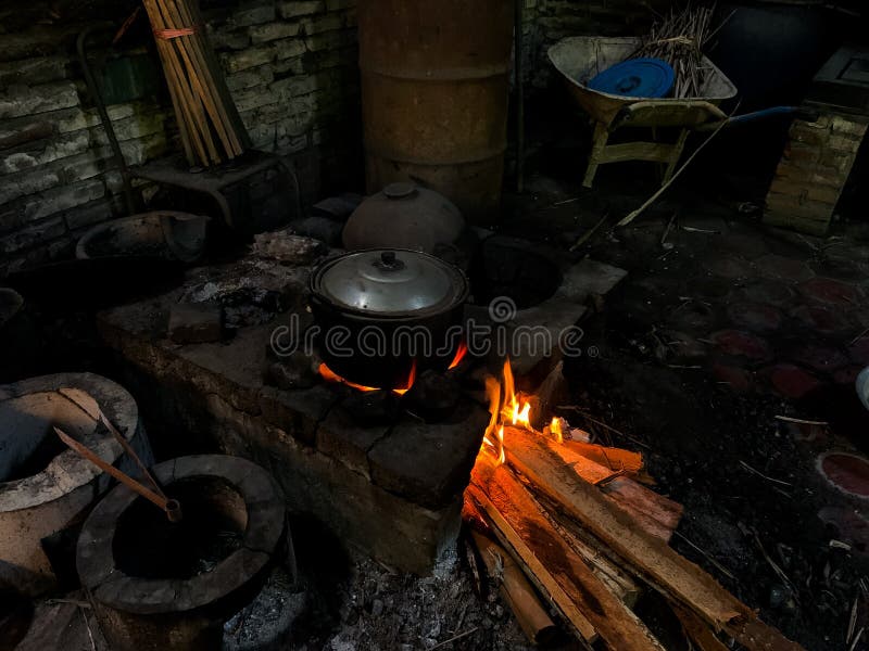 Cooking on a Stove with a Burning Fire Stock Image - Image of burn ...