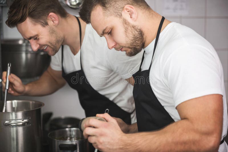 Cooking together stock photo. Image of face, ethnicity - 83819576