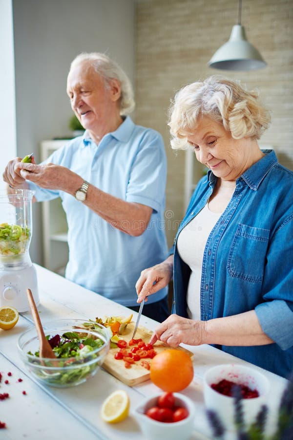 Cooking together stock photo. Image of pensioner, grandfather - 55224104