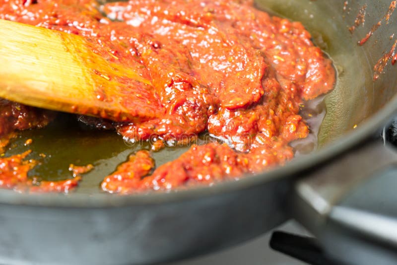 Cooking Tomato Sauce in a Frying Pan Stock Image - Image of parsley ...