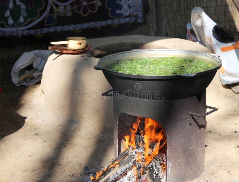 Cooking Traditional Sumalak in a Huge Cauldron Outdoors Stock Photo ...