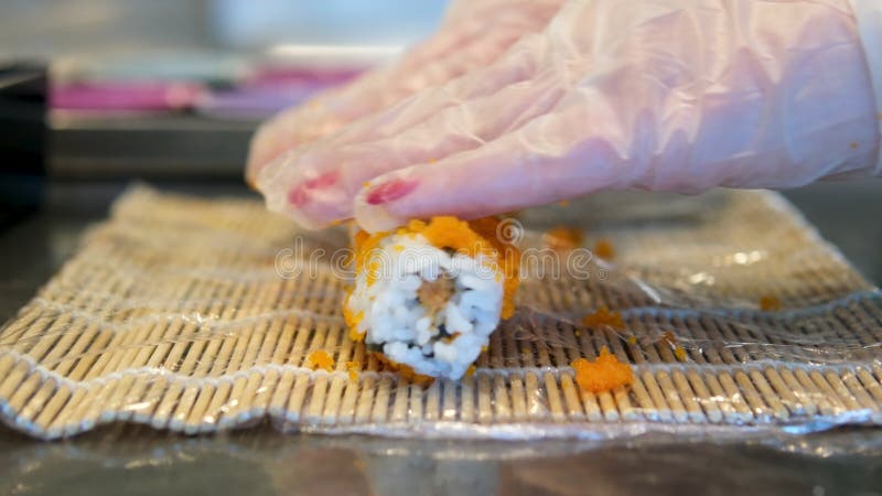Chef Making Sushi Sashimi Nigiri. Master Class. Professional Chef is ...