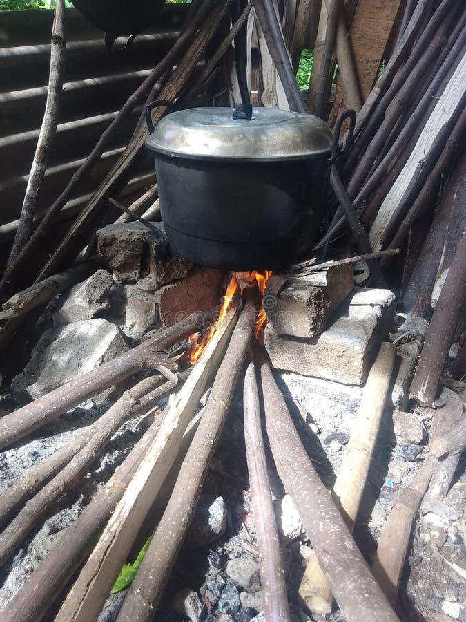 Cooking Using a Wood-burning Stove is Still an Ancient Tradition Stock ...