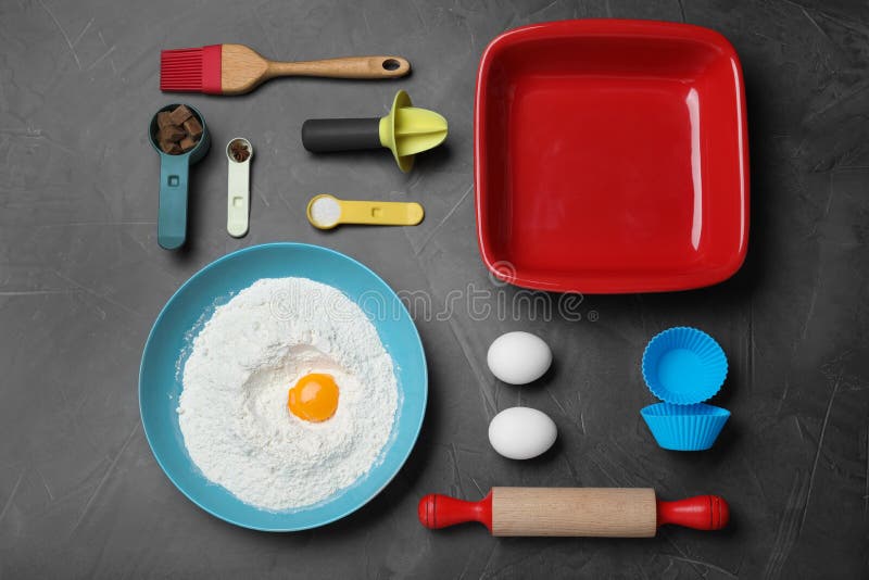 Cooking Utensils and Ingredients on Black Table, Flat Lay Stock Photo ...