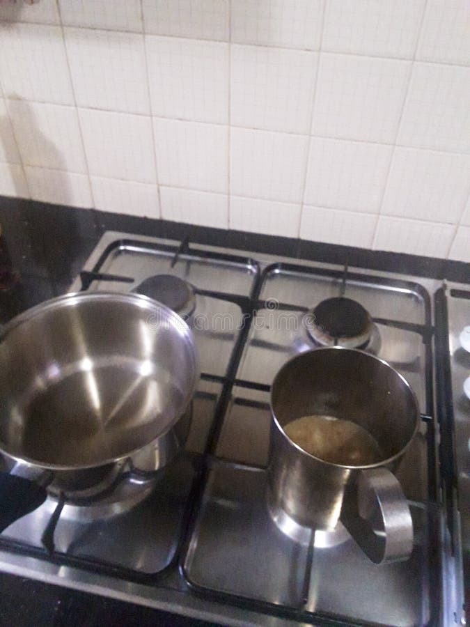 Cooking Utensils on the Stove Stock Image - Image of utensils, boiling ...