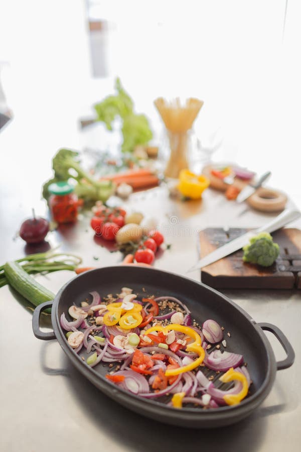 Cooking with Vegetables. the Process of Cooking Vegetables in a Kitchen ...