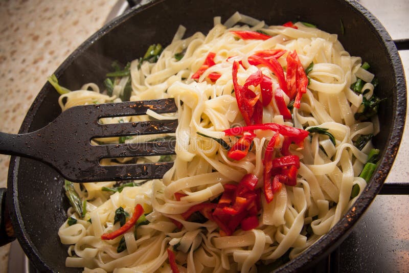 Cooking vegetarian pasta stock photo. Image of delicious - 74073036