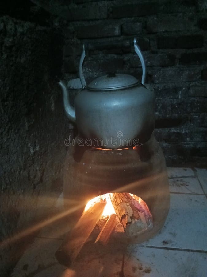 Cooking Water Using a Traditional Stove Stock Image - Image of water ...