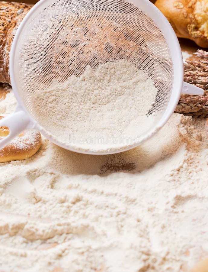 Cooking. White Sieve with Flour and Bread Stock Photo - Image of food ...