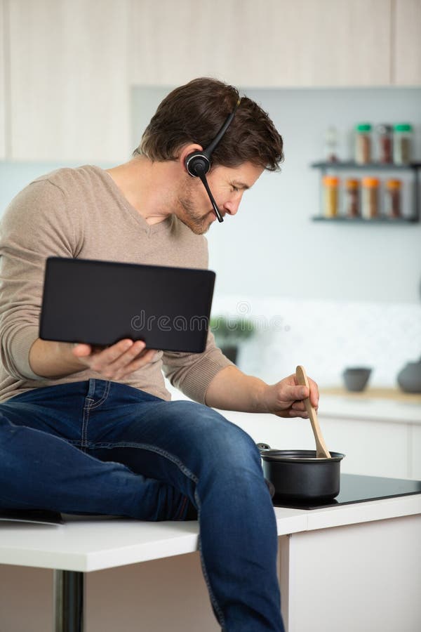 Cooking and Working from Home Stock Photo - Image of cook, male: 324569808