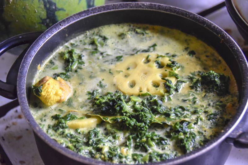 Cooking Yellow Green Curry with Lotus Root and Spices Stock Image ...