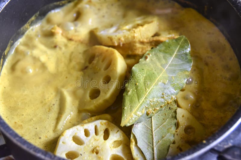 Cooking Yellow Green Curry with Lotus Root and Spices Stock Photo ...