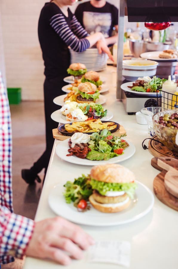 Cooks Preparing Dishes at Restaurant Stock Image - Image of food, dried ...
