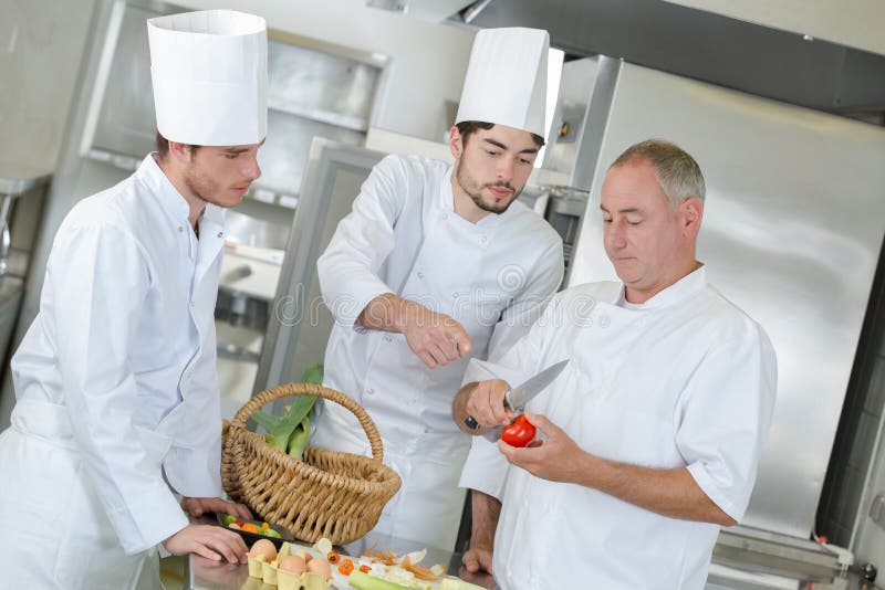 Cooks Working In Restaurant Kitchen Stock Image - Image of restaurant ...