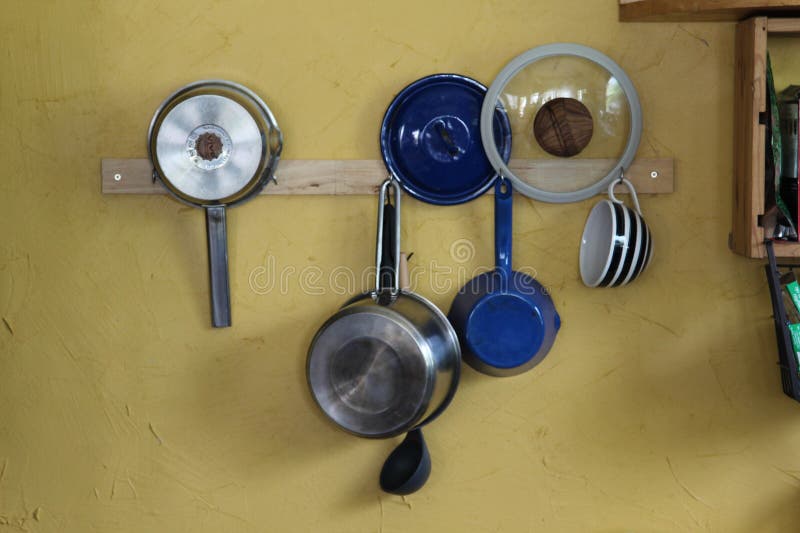The Cookware Hanging on the Wooden Rack Stock Image - Image of board ...