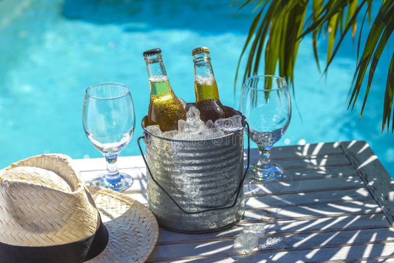 Cool beer in a bucket stock photo. Image of pool, edge - 131577080