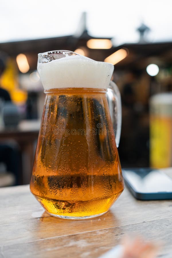 Cool beer full pitcher stock photo. Image of beverage - 315443156