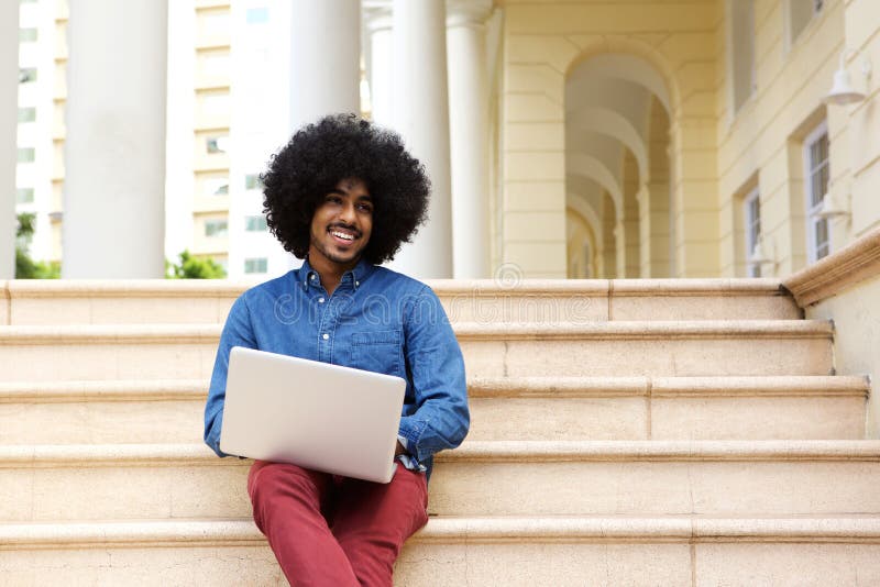 Cool Black Guy Sitting Outside Using Laptop Stock Photo - Image of ...