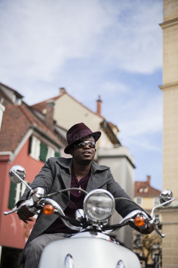 Cool Black Man Riding a Scooter Stock Image - Image of outside, model ...
