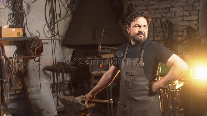 Cool Blacksmith Portrait with Beard in Workshop Stock Photo - Image of ...