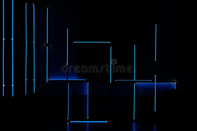 Cool Blue Neon Lights on a Black Wall Stock Image - Image of creative ...