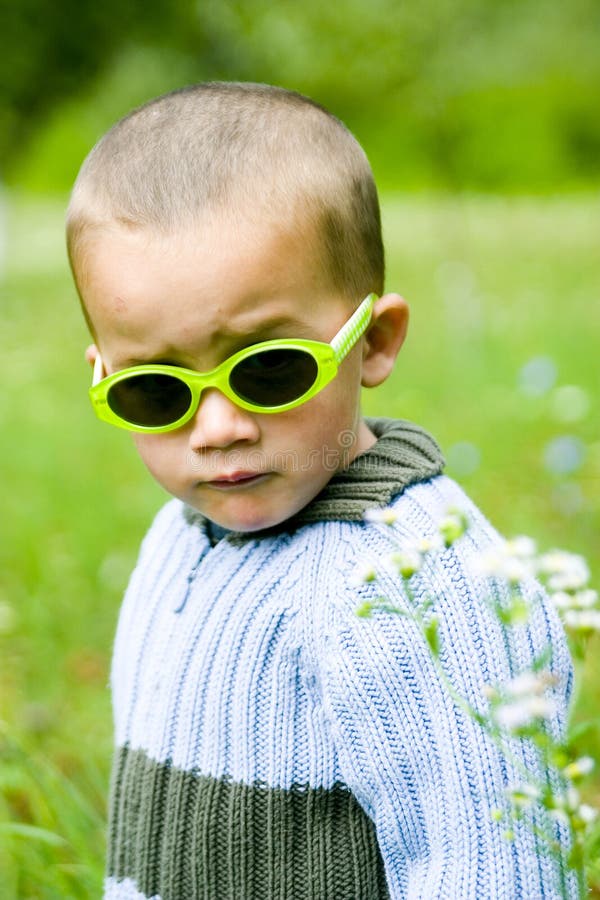 Cool boy stock image. Image of caucasian, sunglasses, green - 3837627