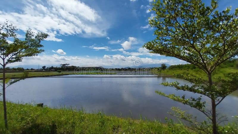 Cool Breeze with the Beauty of the Sky and Lake Stock Image - Image of ...